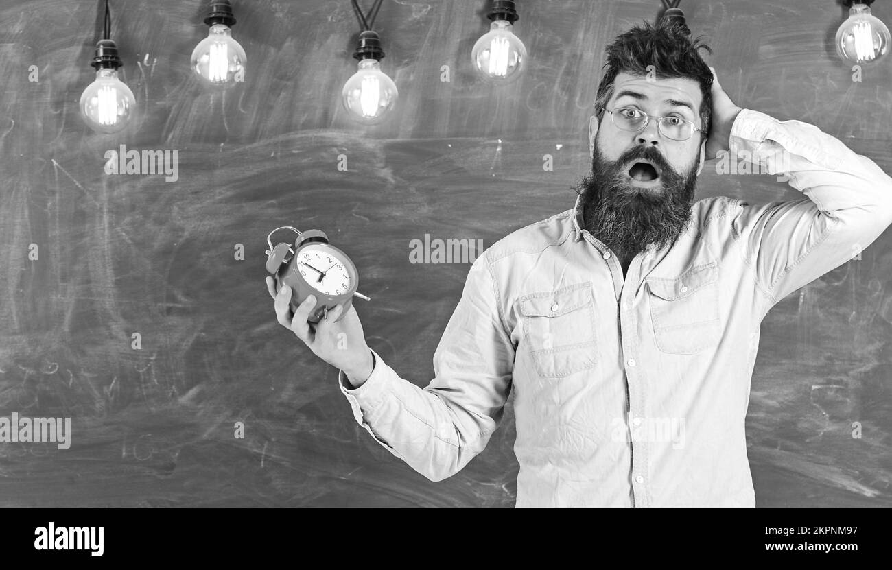 Forgot about time concept. Man with beard and mustache on confused face ...