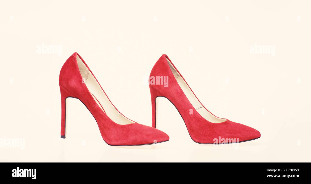 Shoes made out of red suede on white background, isolated. Pair of ...