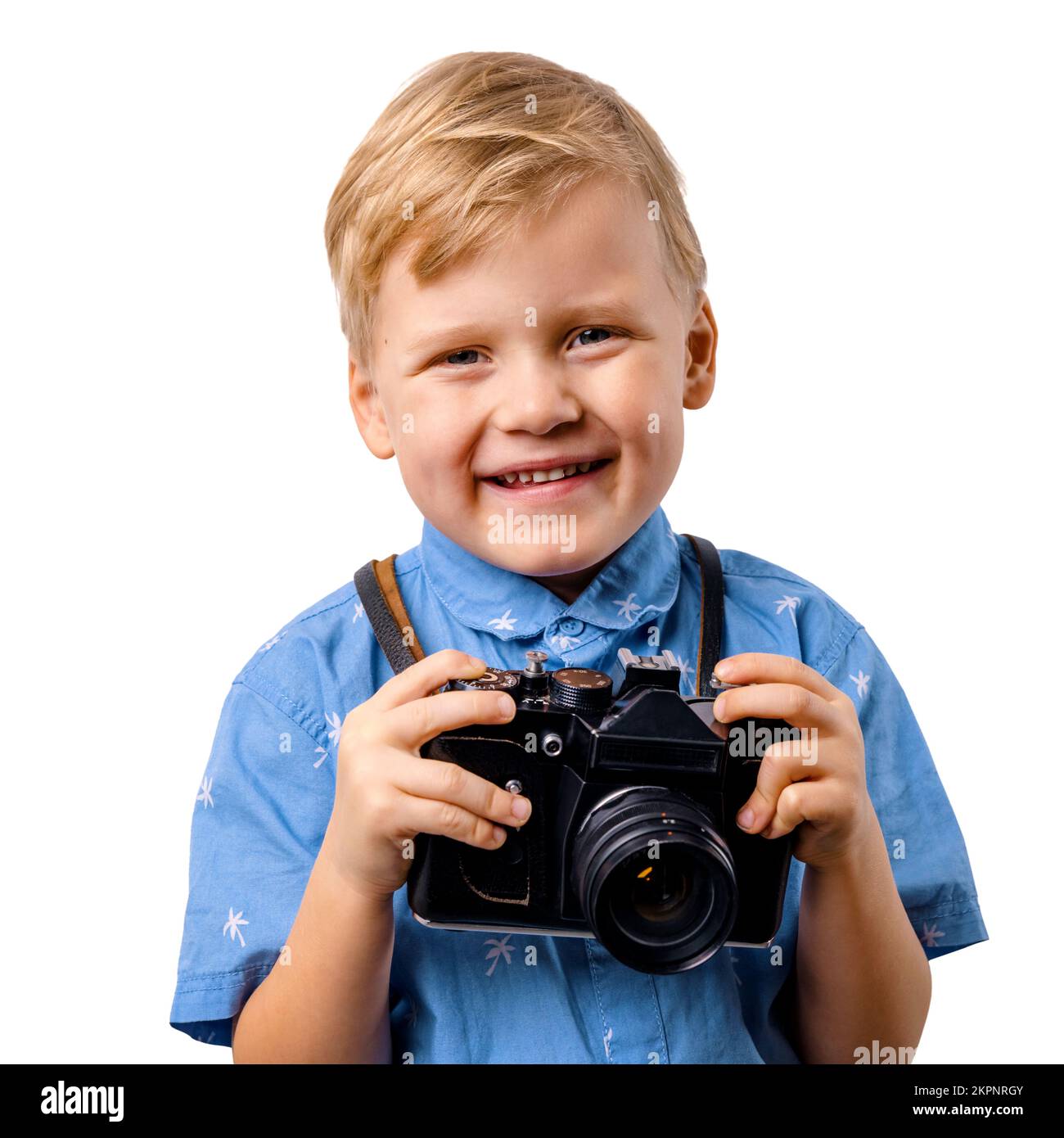 portrait of little smiling boy with retro film camera in hands isolated ...