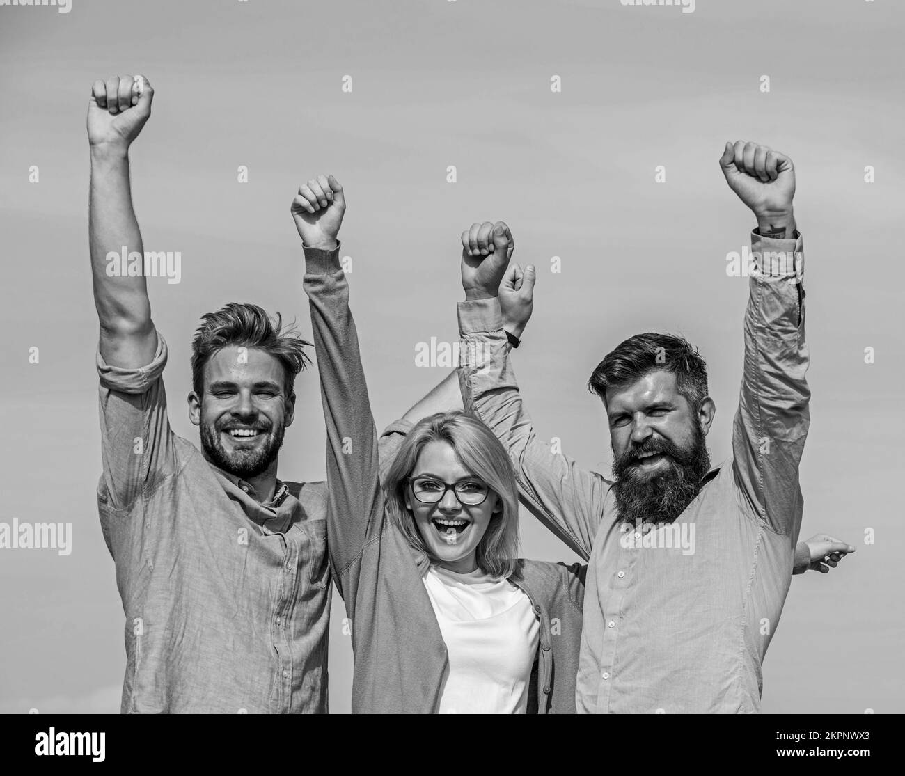 Team celebrating colleague success Black and White Stock Photos ...