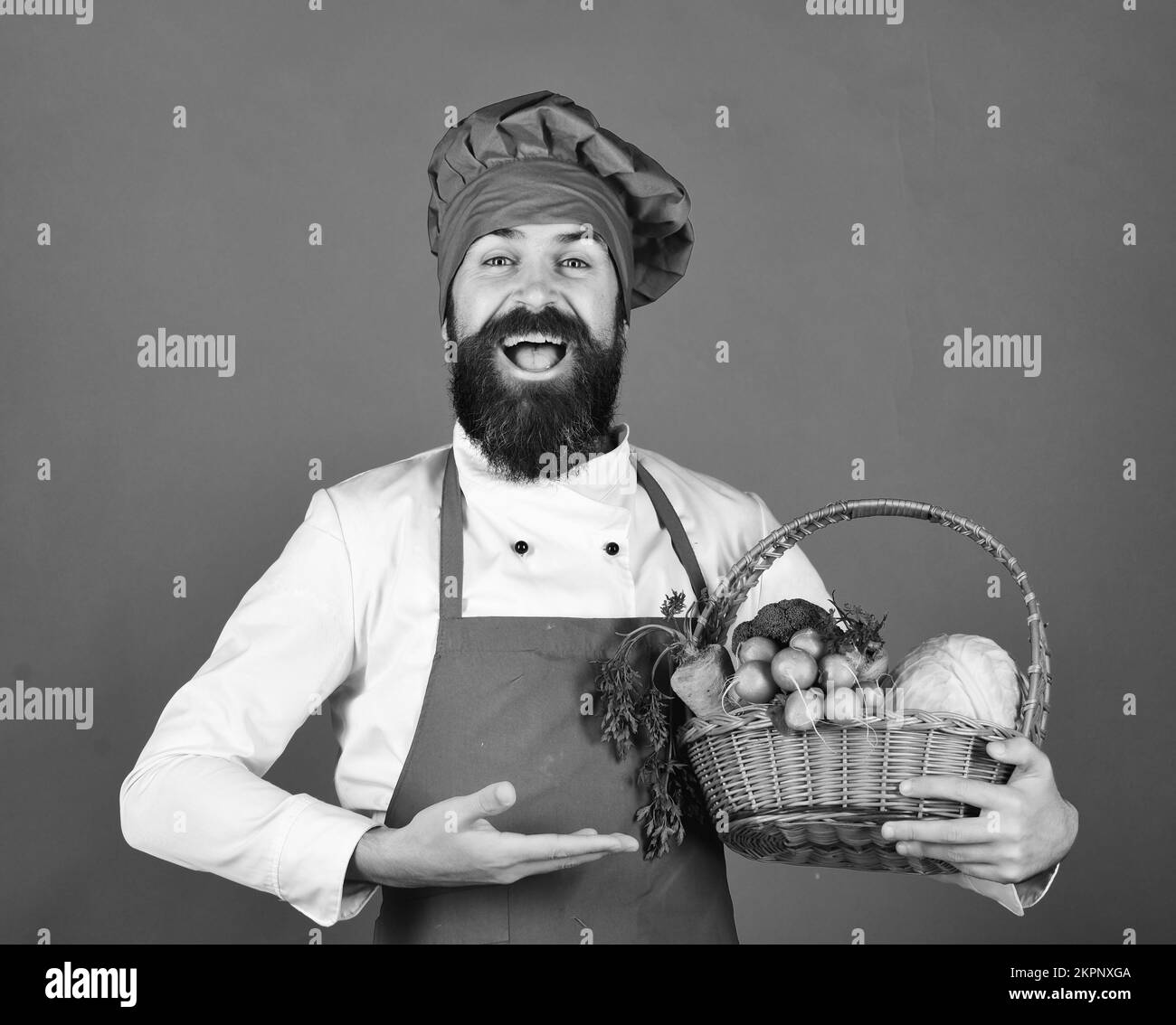 Man with beard on green background. Cook with smile face Stock Photo ...