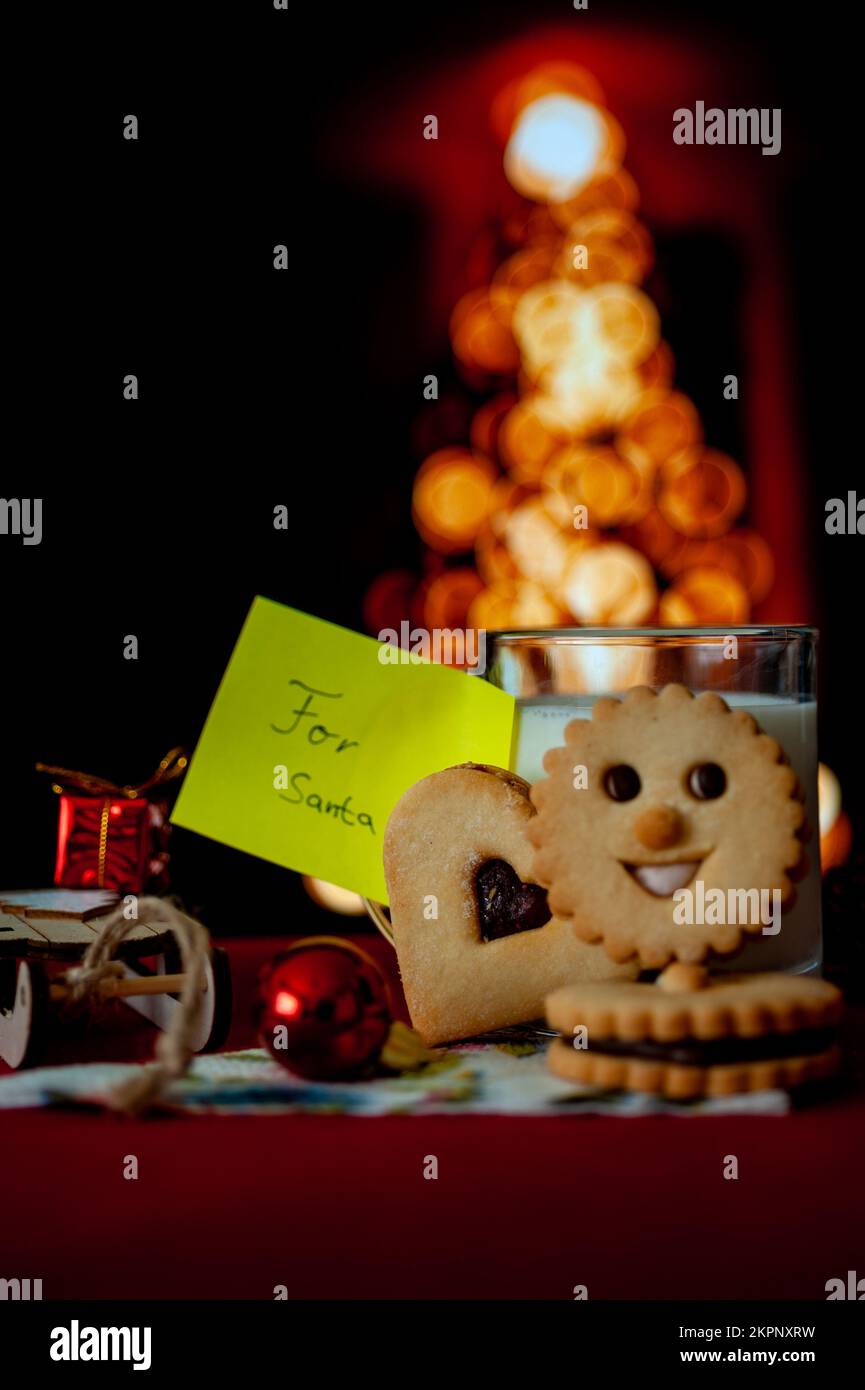 christmas decoration conceptual photo with a mug of milk and cookies ...