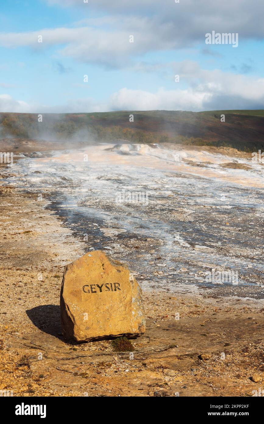 Stone marking the site of geyser in Iceland Stock Photo - Alamy