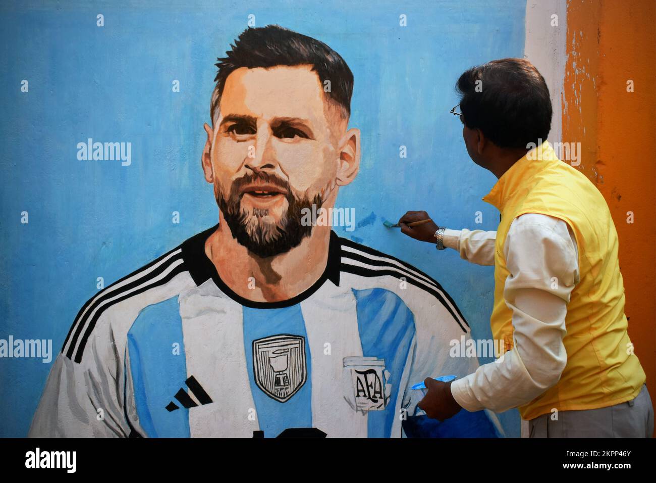 A painter applies finishing touches to an image of Argentina's soccer ...