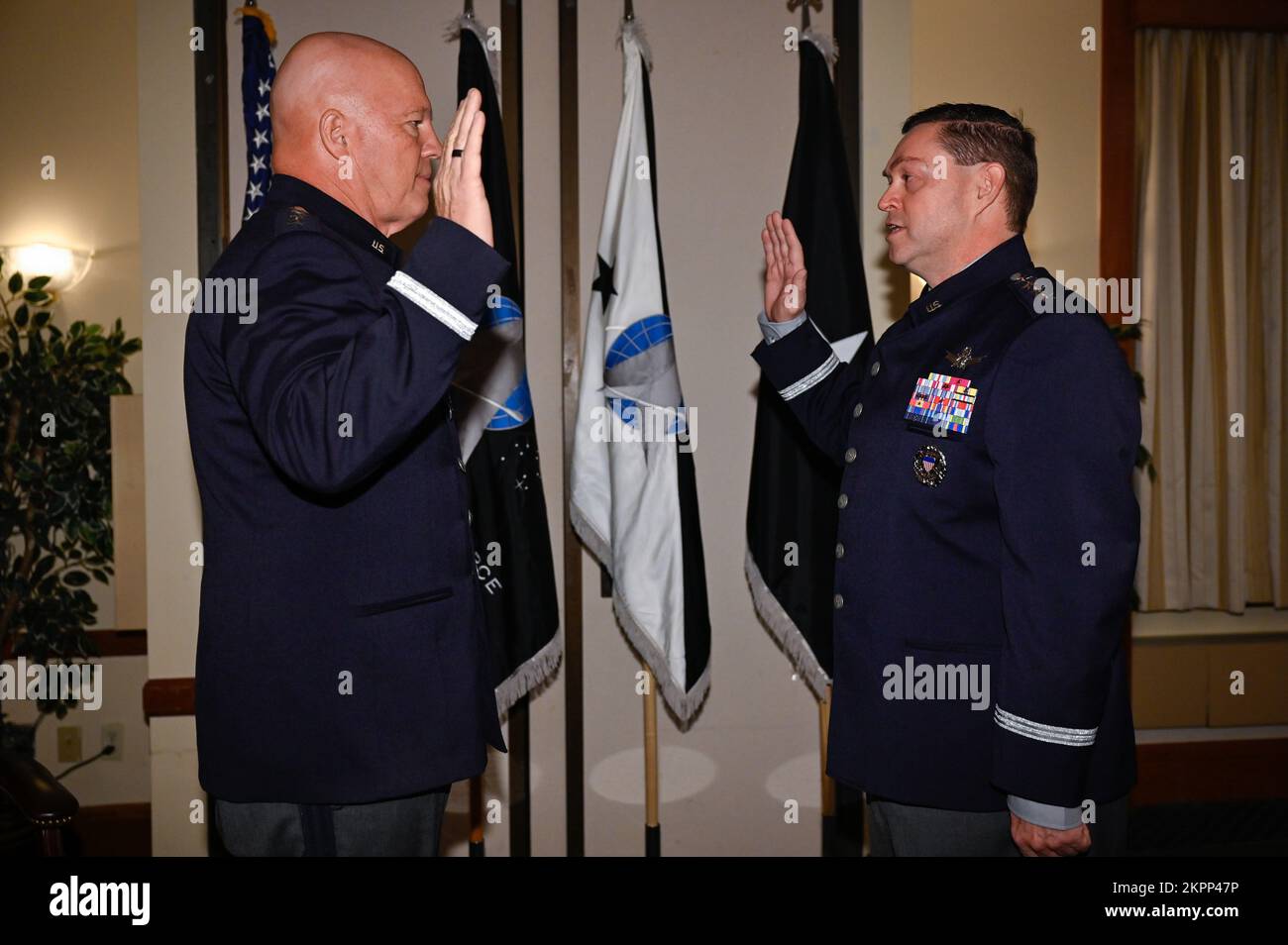 Chief of Space Operations Gen. John W. “Jay” Raymond, left, delivers ...