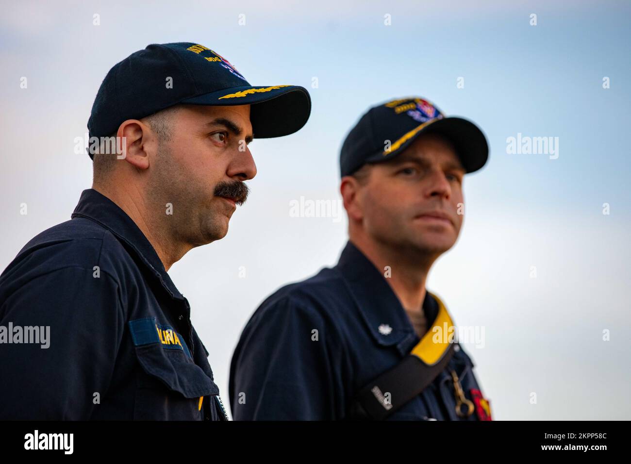 Cmdr. Robert Molinaro, left, the oncoming executive officer of Arleigh ...