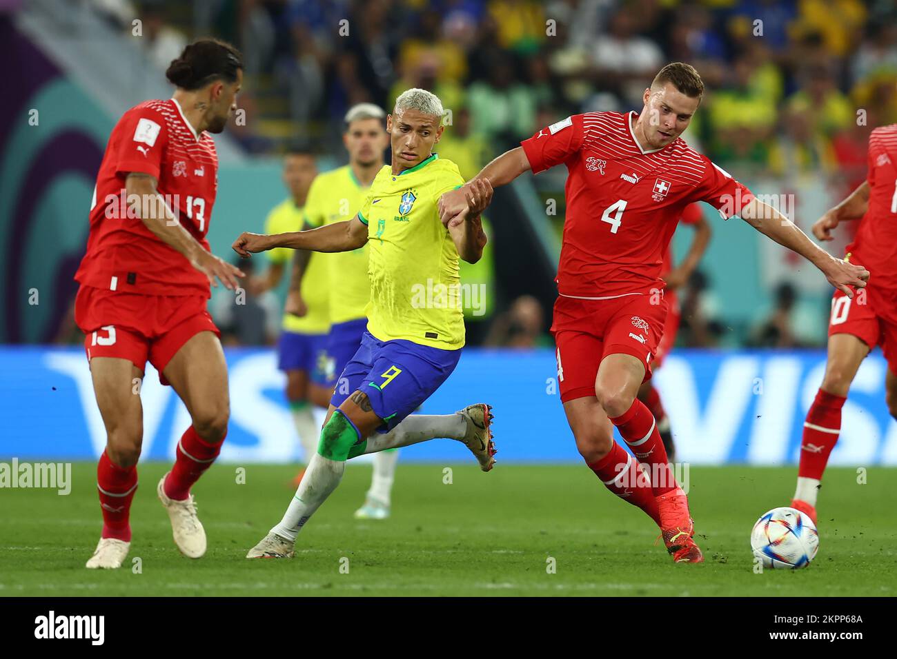 Doha, Qatar. 28th Nov, 2022. Richarlison (C) of Brazil in action with ...