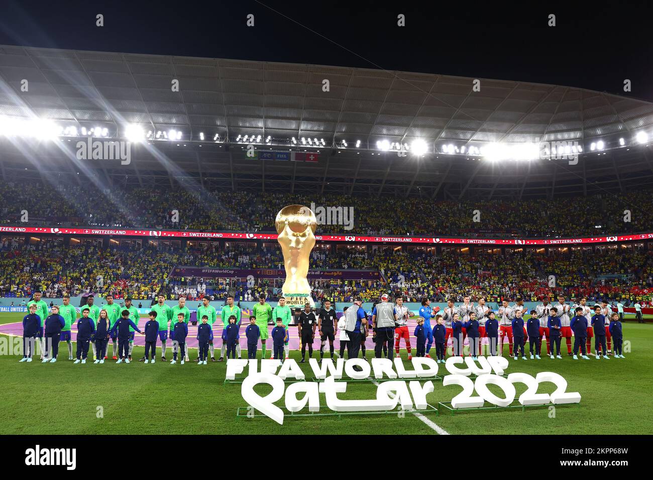 Doha, Qatar. 28th Nov, 2022. The two teams line up during the 2022 FIFA ...