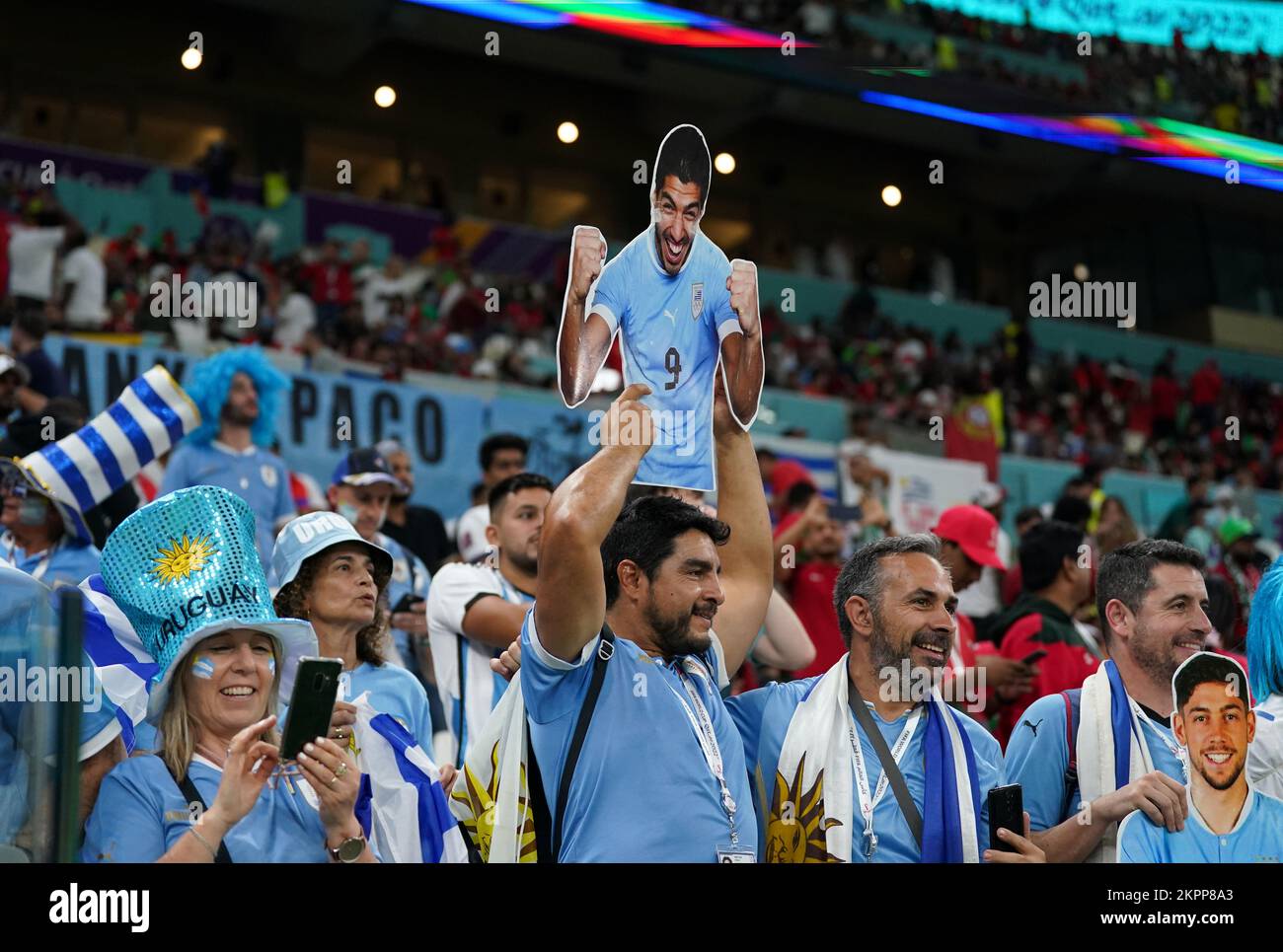 Uruguay fan with a cut-out of Luis Suarez in the stands before the FIFA ...