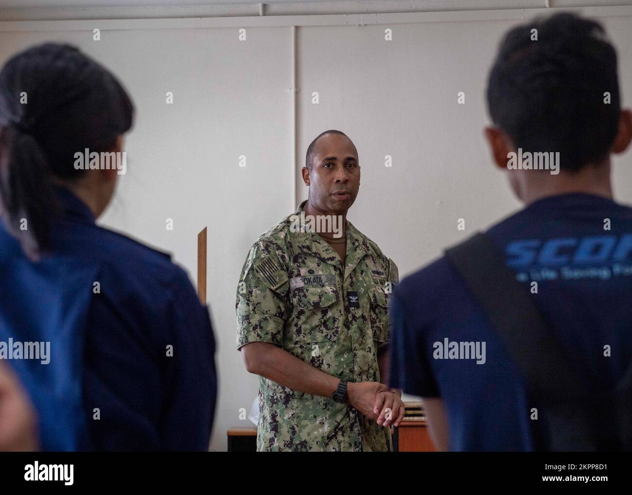 221102-N-HG389-0130 SINGAPORE (Nov. 2, 2022) -- From left, Capt. Frank ...