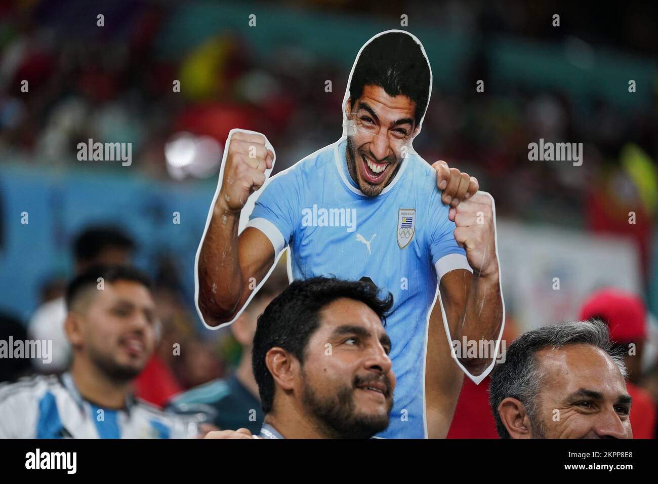 Uruguay fan with a cut-out of Luis Suarez in the stands before the FIFA ...