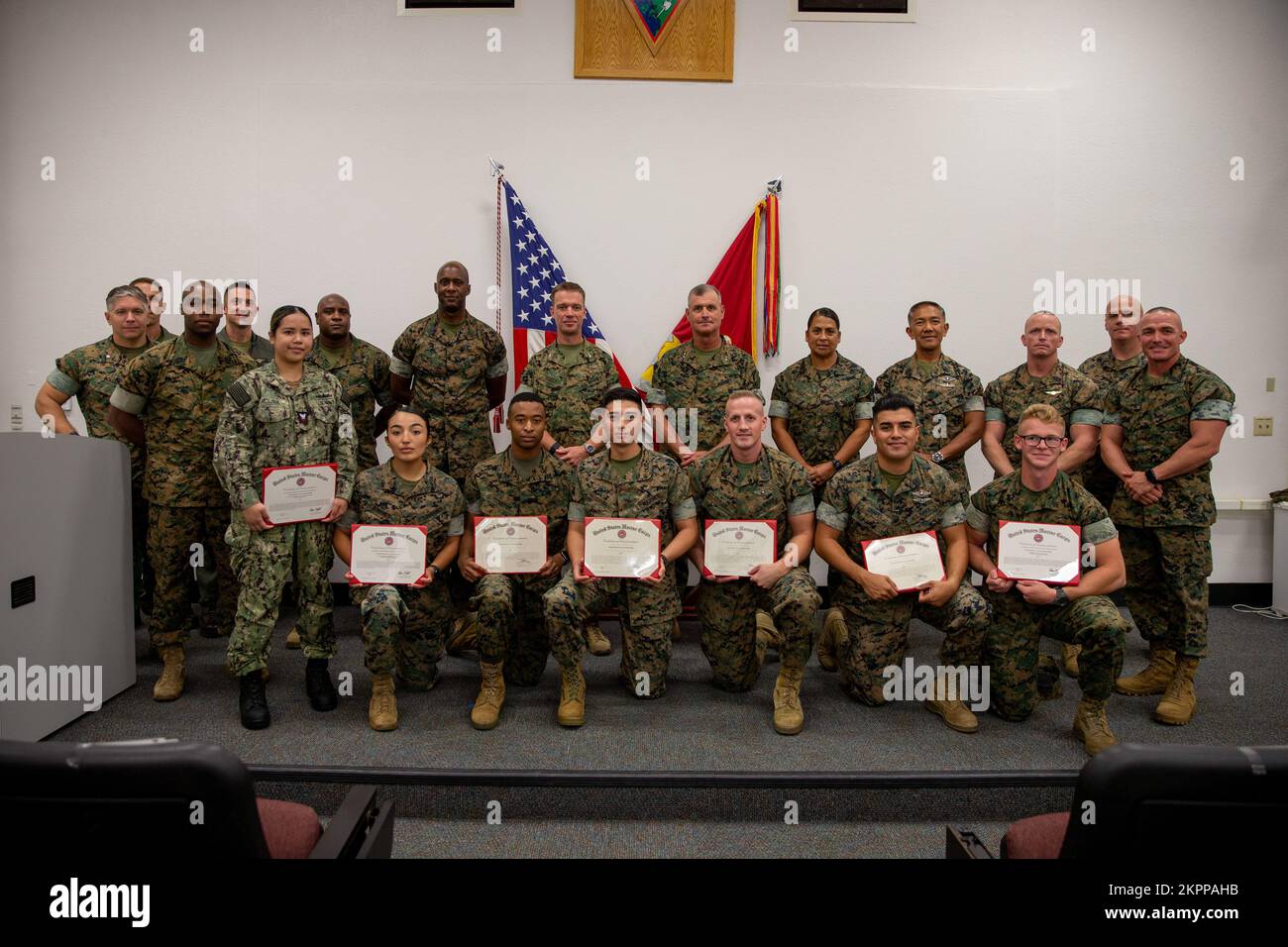 Award recipients and their leadership pose for a photo during the ...
