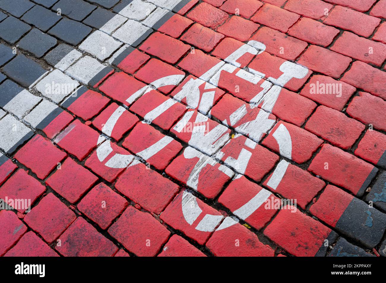 Red bike path sign on the street in Prague Stock Photo - Alamy