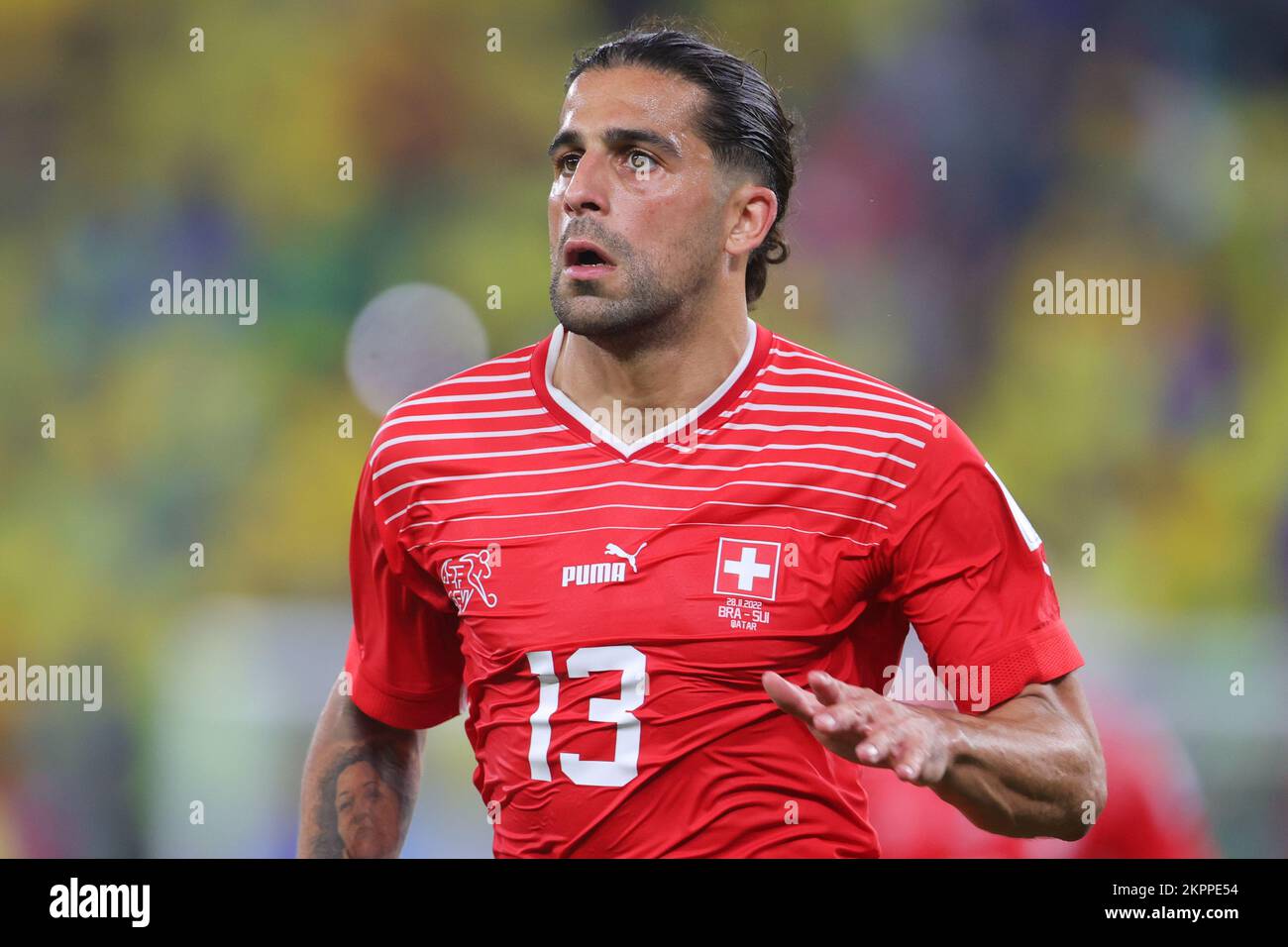Doha, Qatar. 28th Nov, 2022. Ricardo Rodriguez of Switzerland chases ...