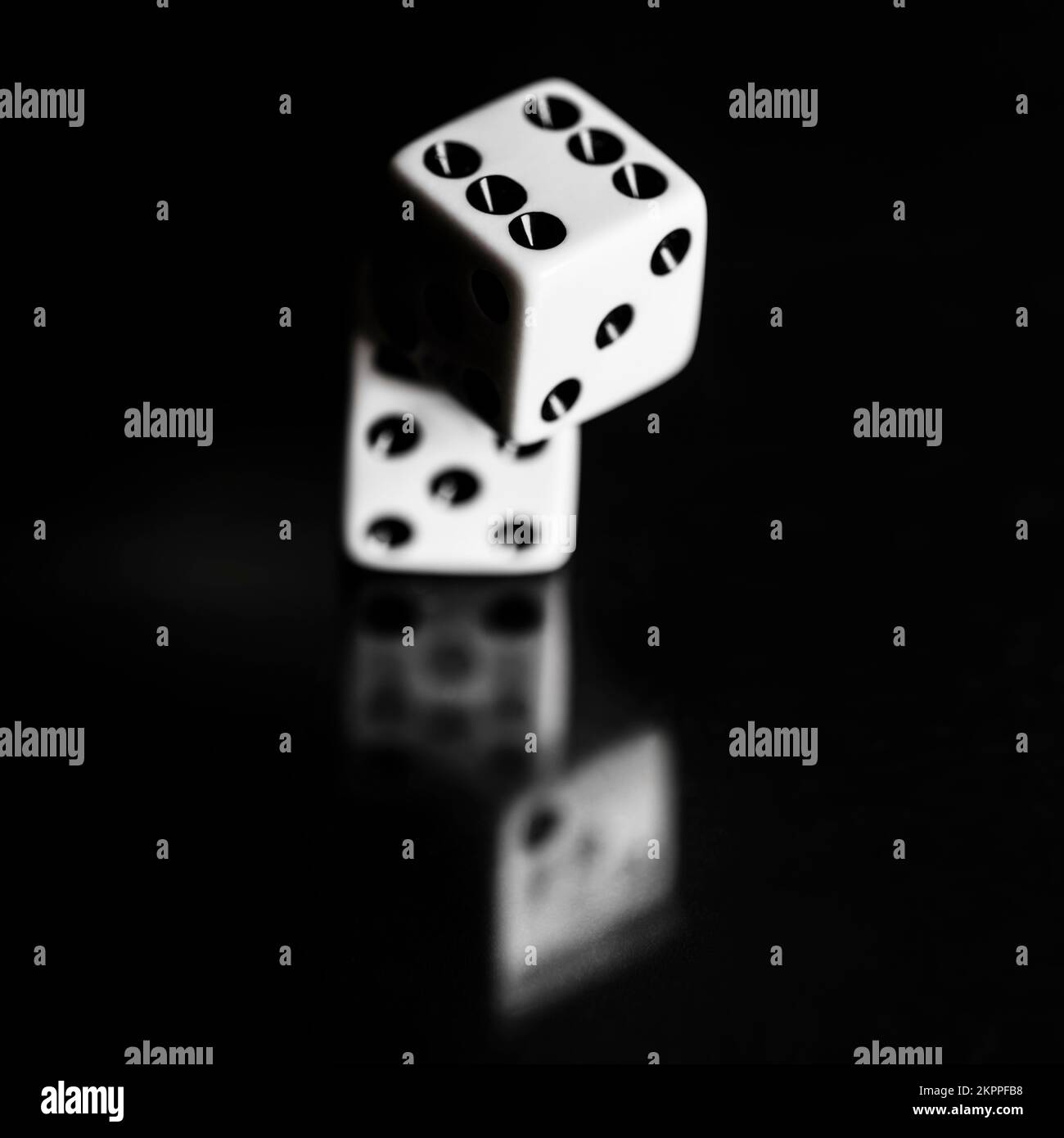 Close up two rolling dice hi-res stock photography and images - Alamy