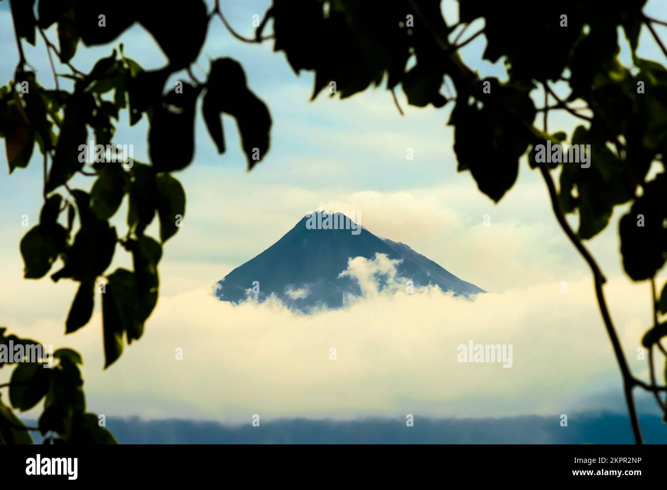 Smoking summit above clouds of Mt Karangetang, an active Pacific Ring ...