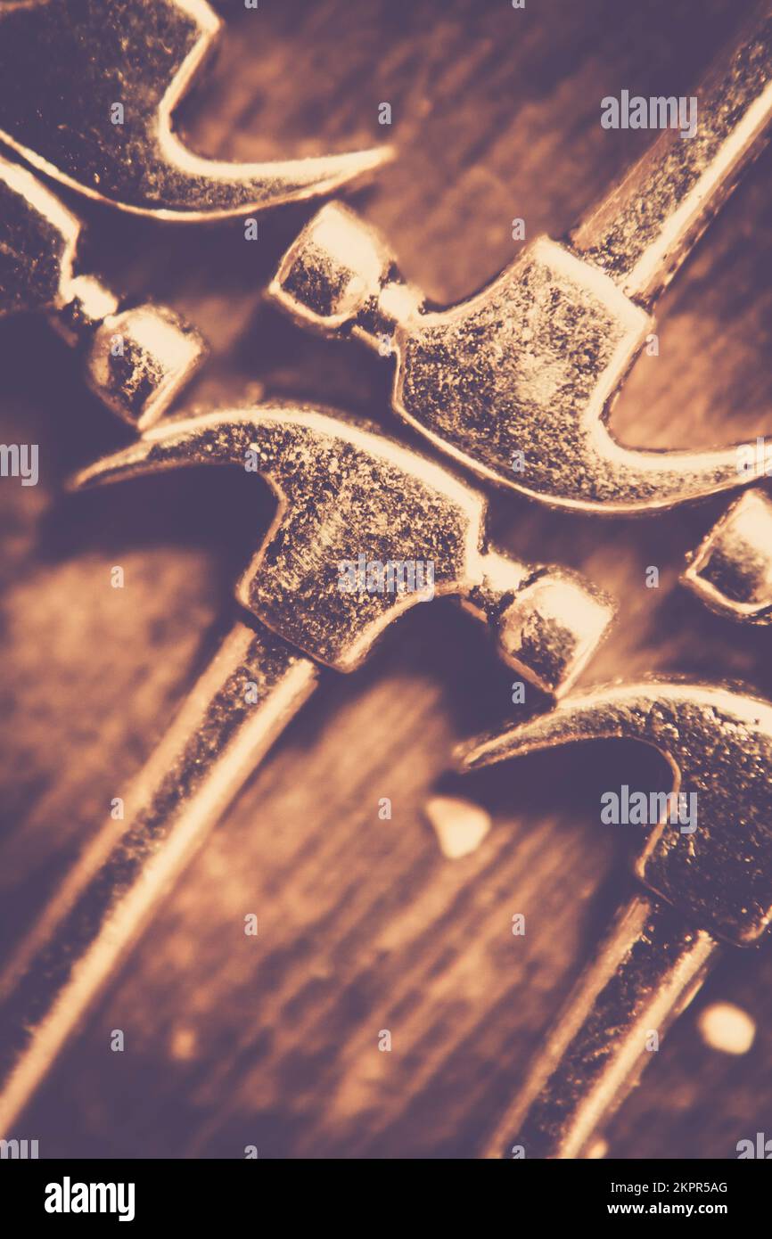 Industrial style still-life on a collection of hardware hammers of ...