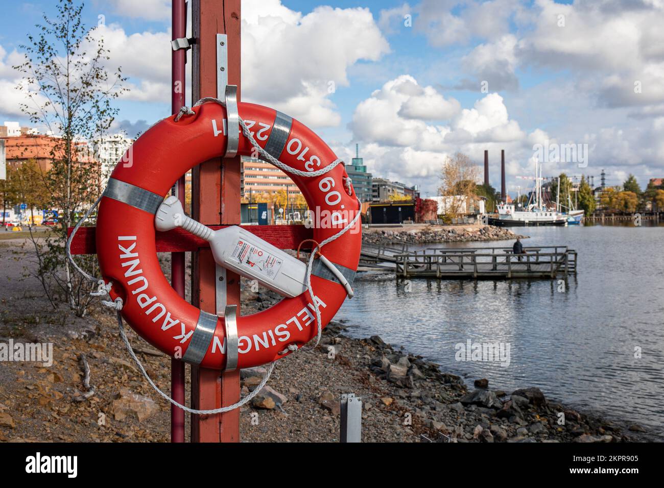 Lifebuoy in Merihaka or Sörnäinen seafront in Helsinki, Finland Stock ...