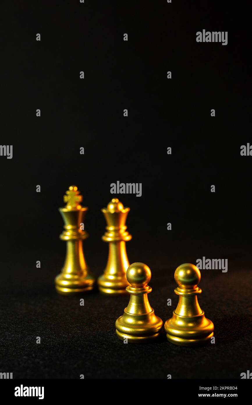 Golden chess pieces hi-res stock photography and images - Alamy