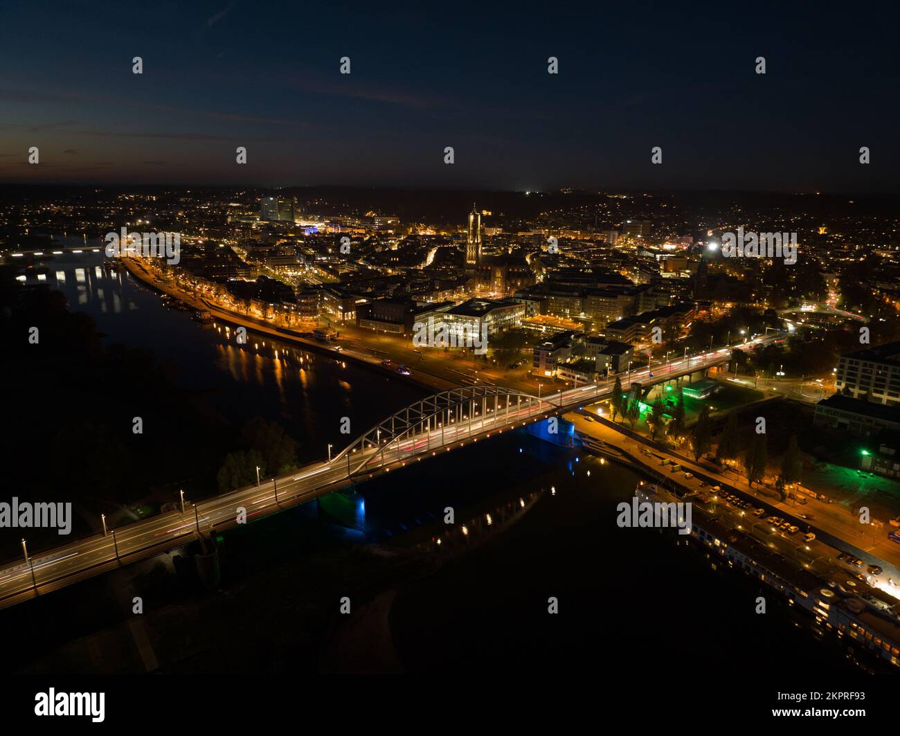 Arnhem city in the Netherlands by night Aerial drone. City center ...