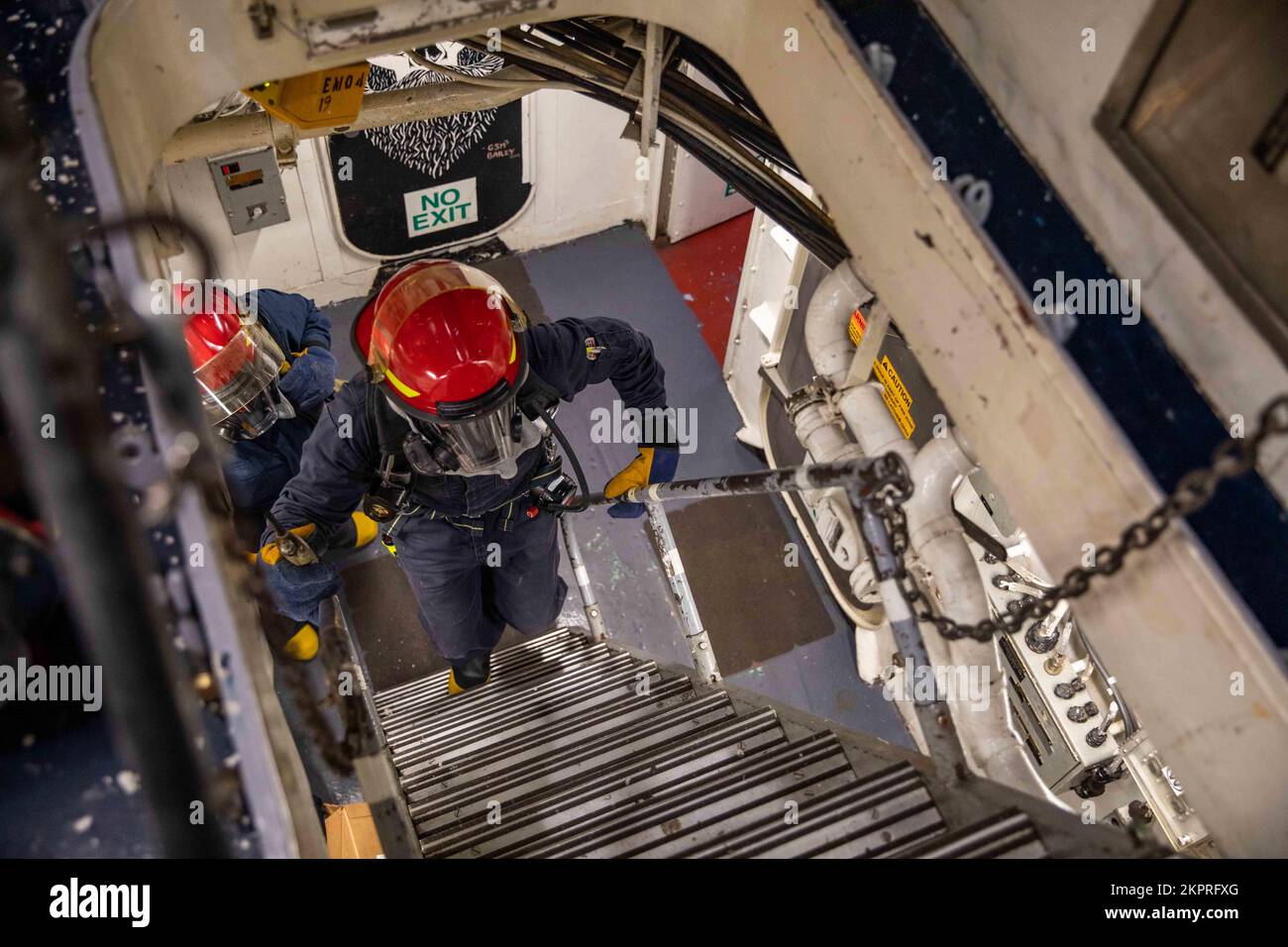 NORTH SEA (Nov. 2, 2022) Sailors climb a ladderwell during a damage ...