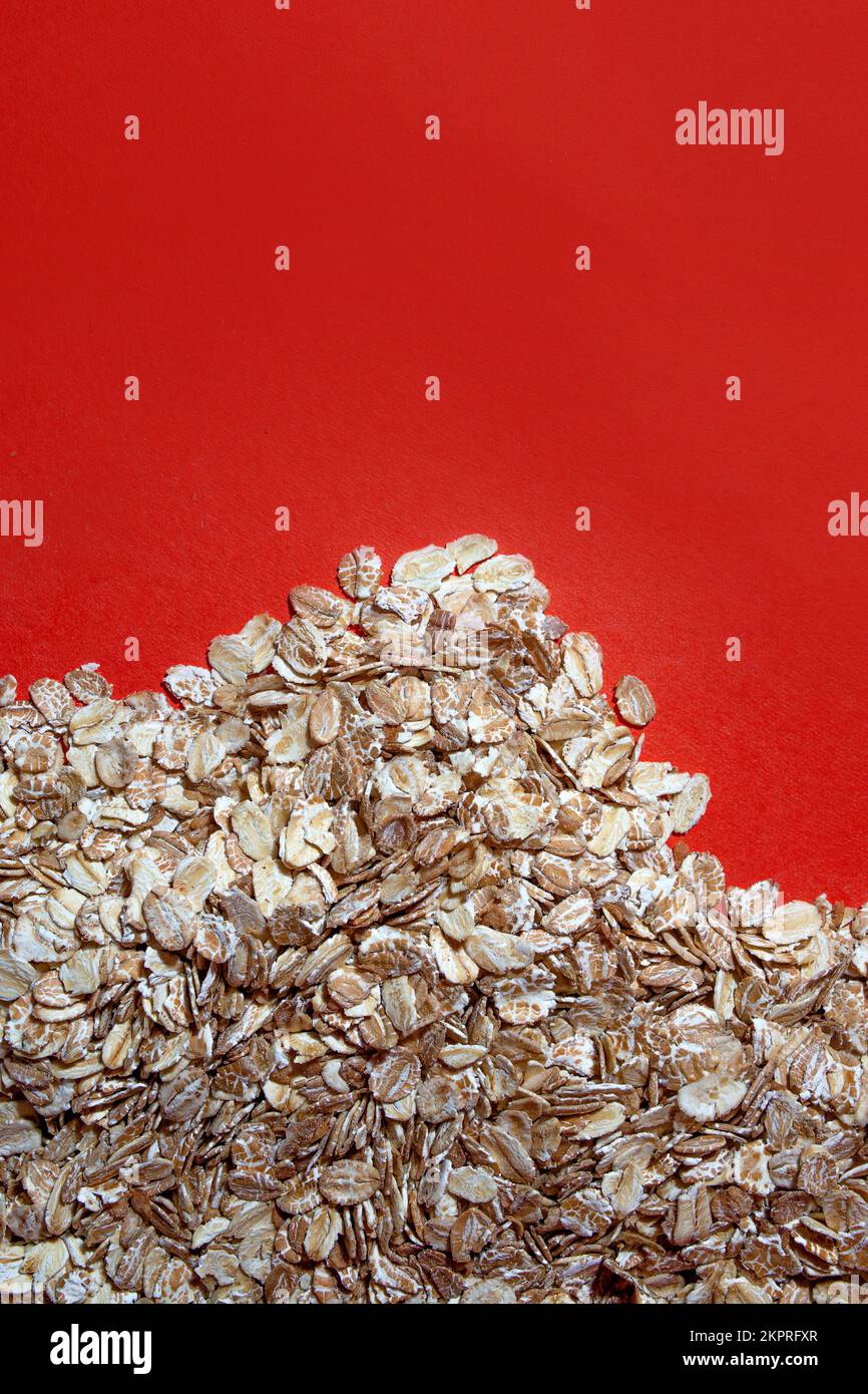 Oat flakes on red hi-res stock photography and images - Alamy