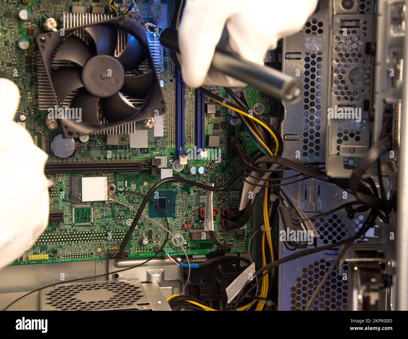 side view technician repairing computer Stock Photo - Alamy