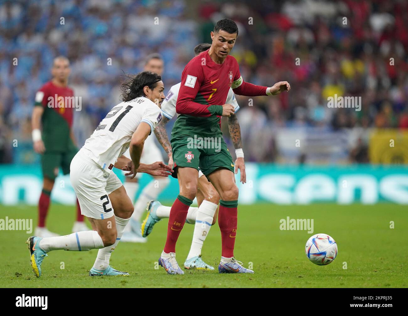 Uruguay's Edinson Cavani (left) and Portugal's Cristiano Ronaldo in ...
