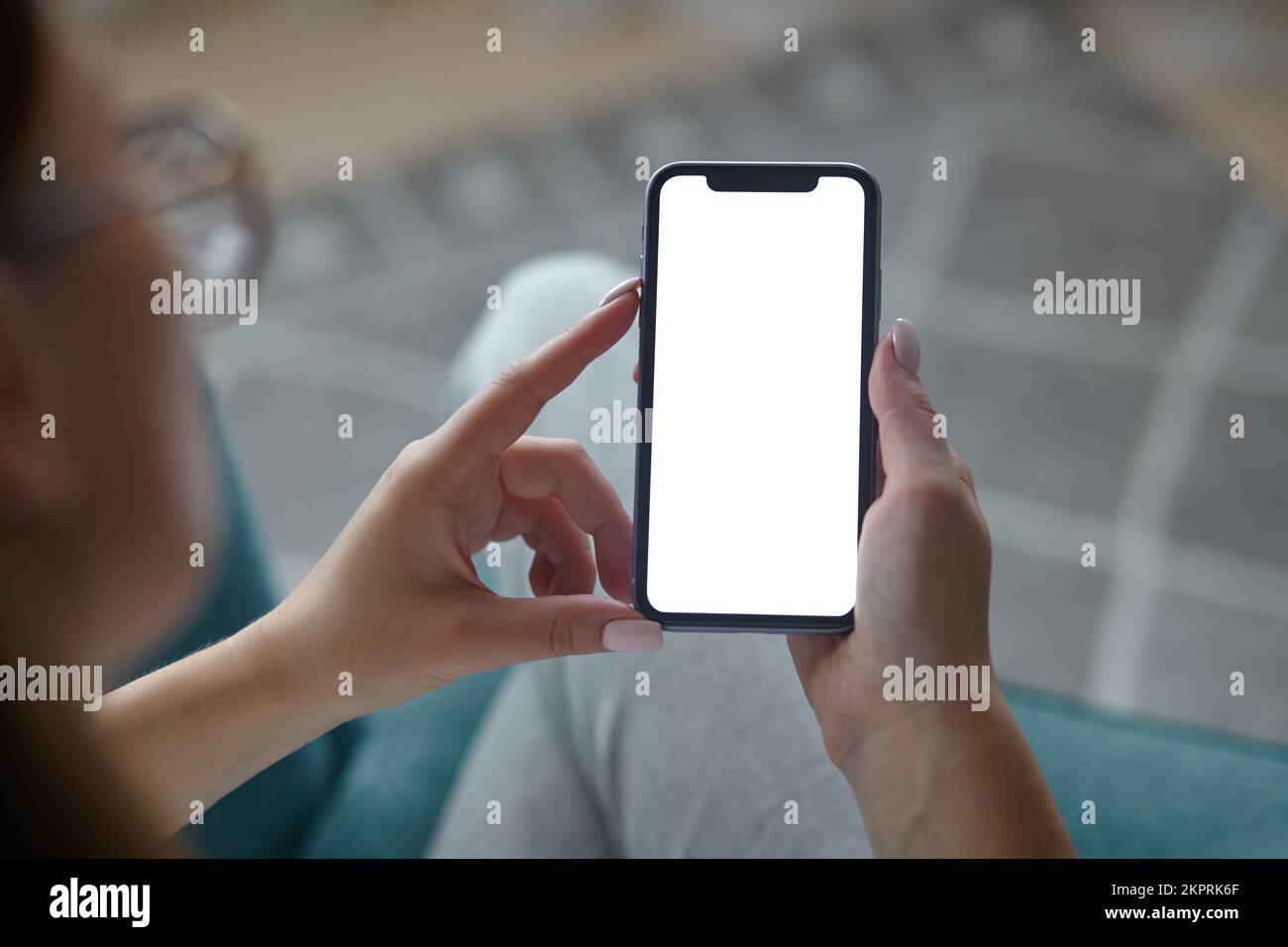 Mock up white screen blank mobile phone in woman hands holding Back ...