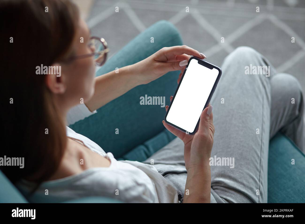 Mock up white screen blank mobile phone in woman hands holding Back ...