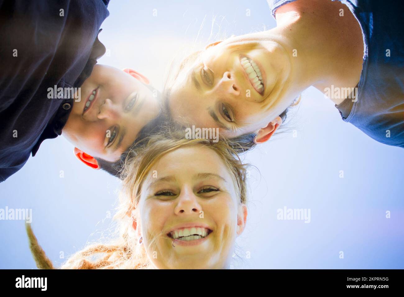 Boy faces in a circle hi-res stock photography and images - Alamy