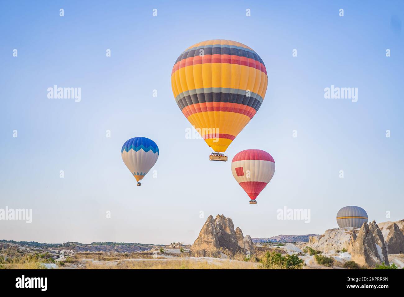 Colorful hot air balloon flying over Cappadocia, Turkey Stock Photo - Alamy