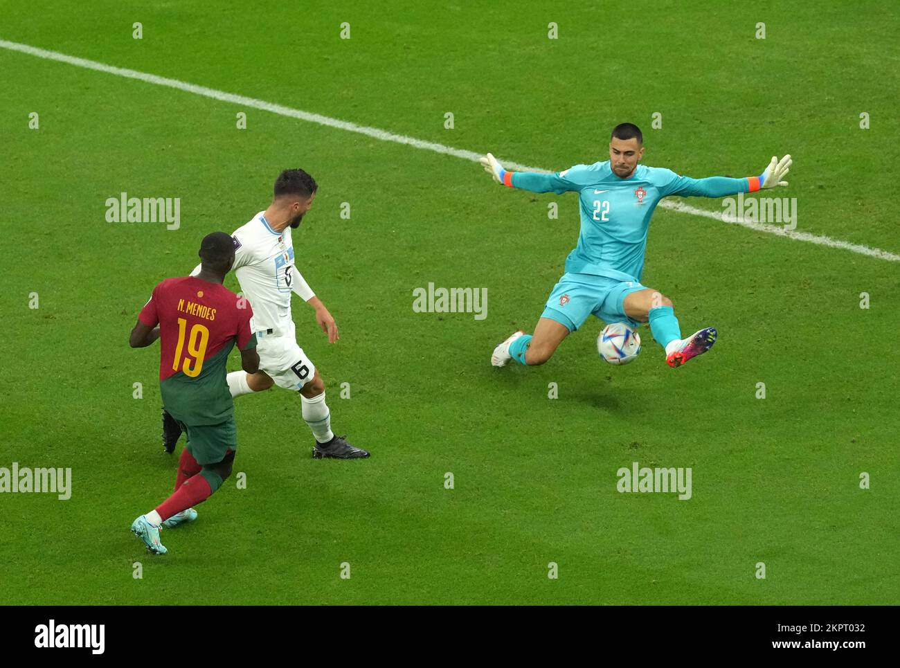 Uruguay's Rodrigo Bentancur (centre) attempts a shot on goal, saved by ...