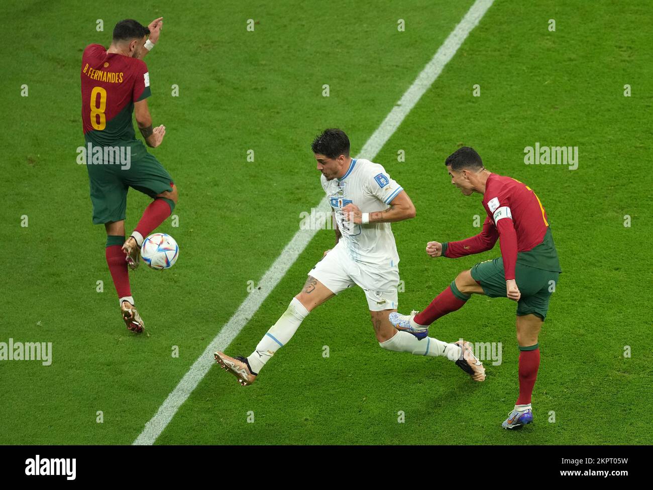 Portugal's Cristiano Ronaldo (right) attempts a shot on goal, hitting ...