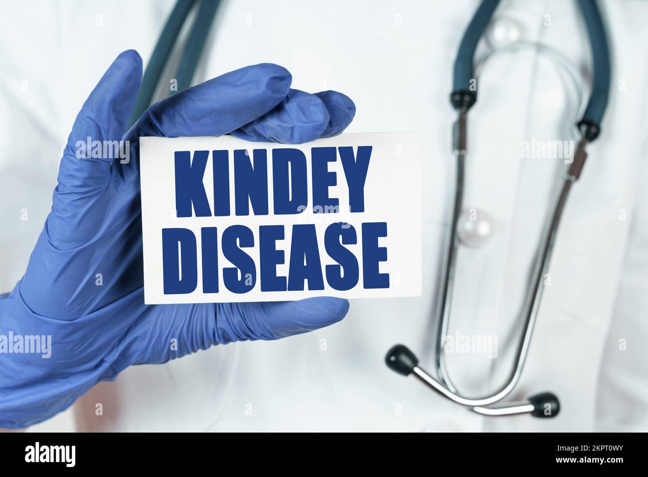 Medicine concept. The doctor holds a business card that says - KINDEY ...