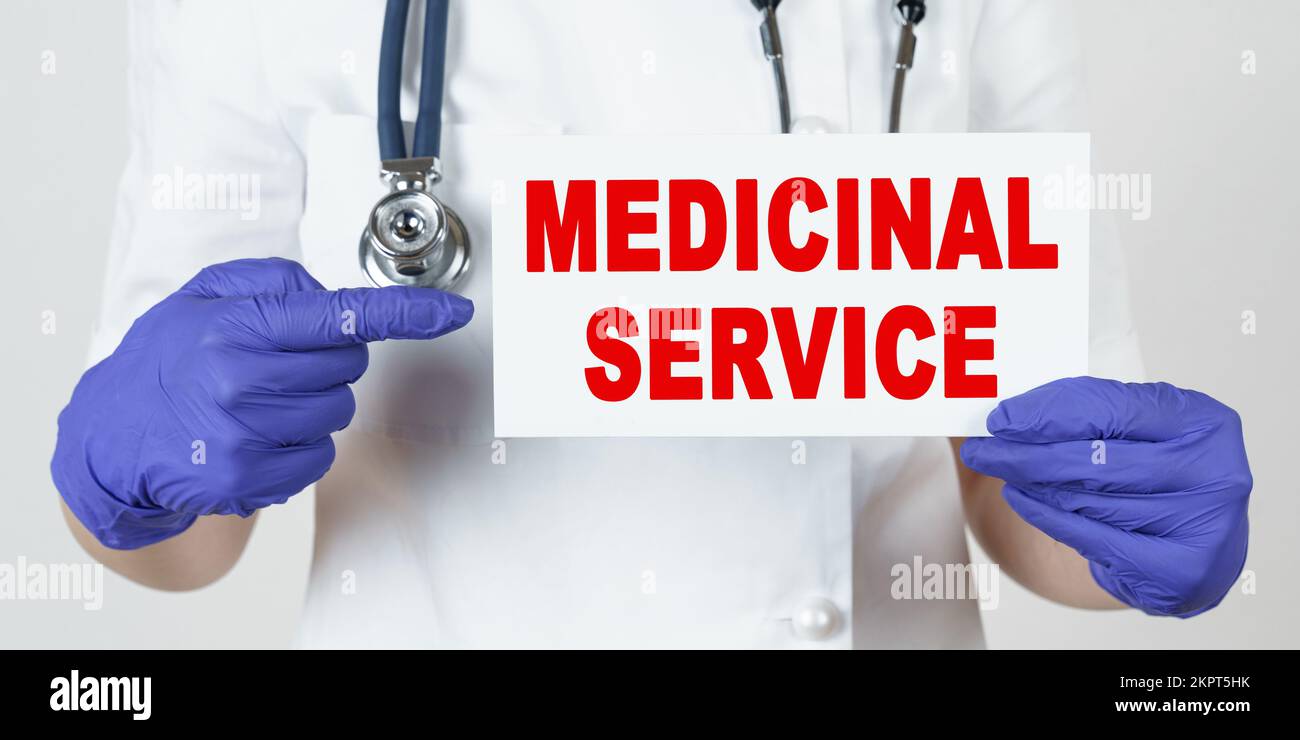 Medicine and health concept. The doctor points his finger at a sign ...