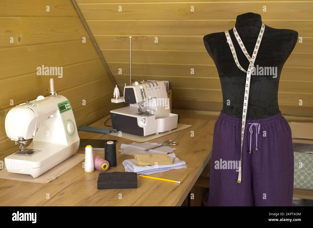 Background image of fashion designer sewing workshop. Background Stock ...