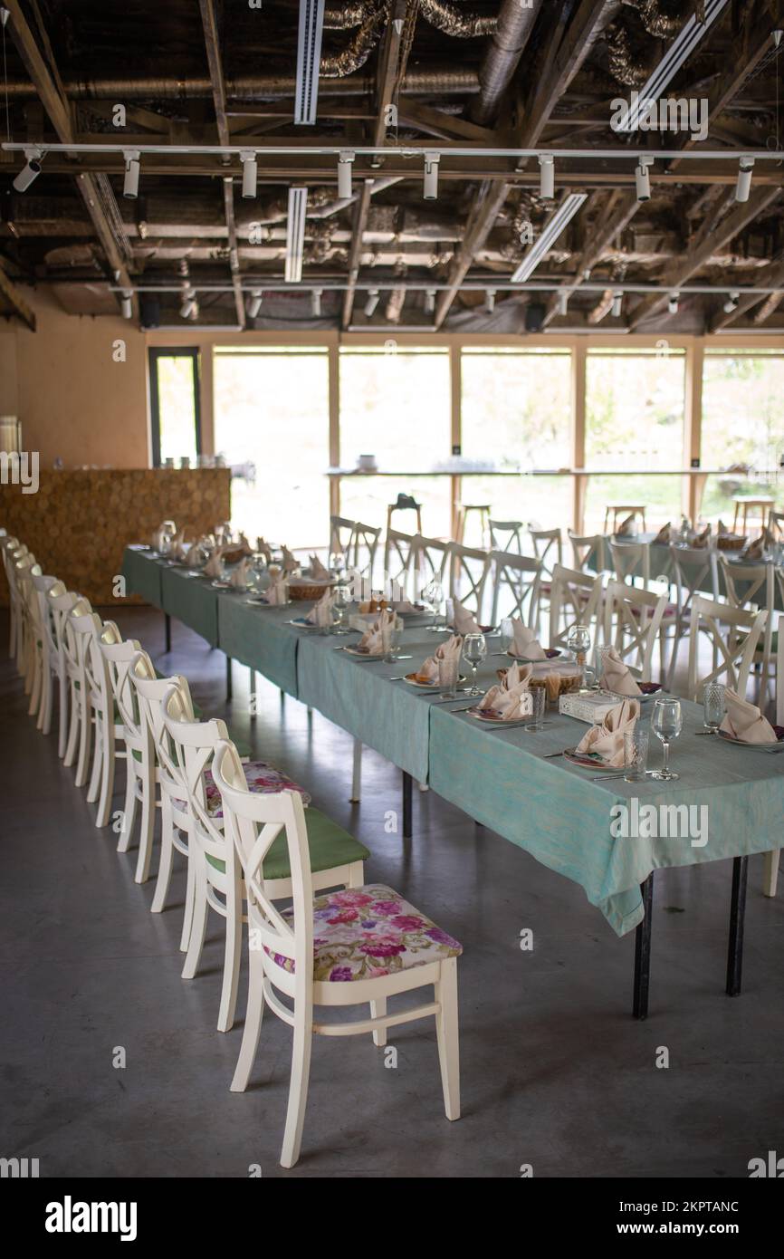 table setting with napkins in light colors in cafe Stock Photo - Alamy