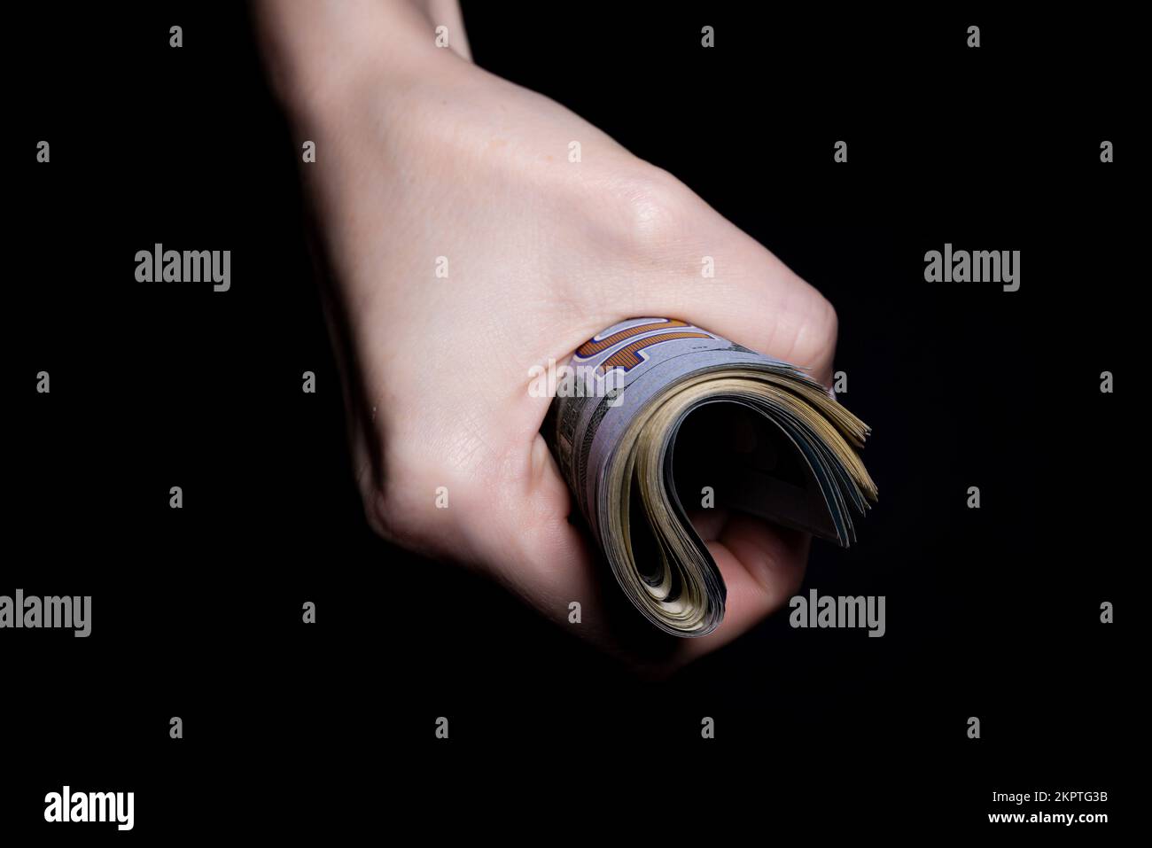 two hands with dollars. Closeup female hand giving money for something ...