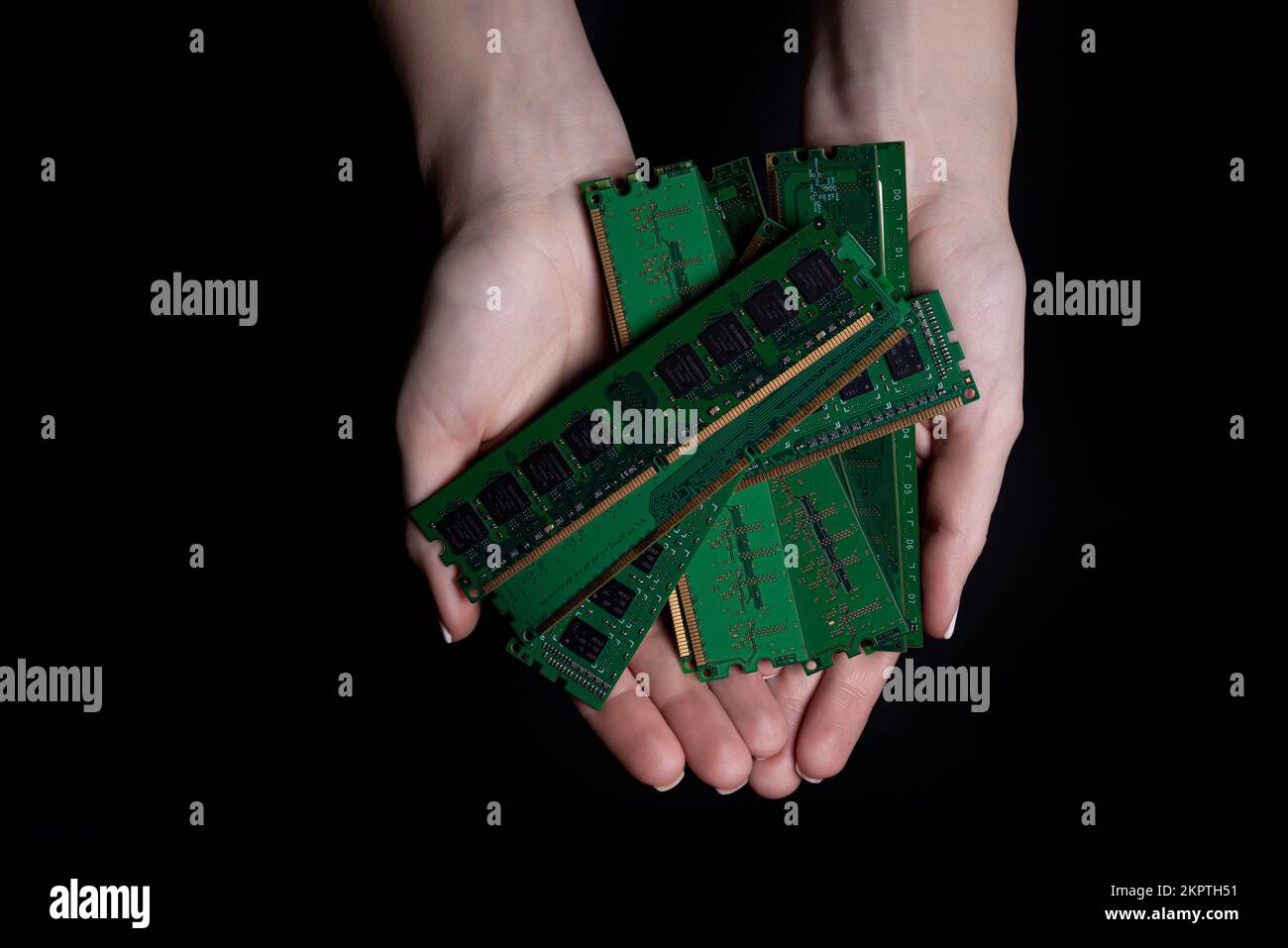 female hands hold memory computer card . american woman wearing ...