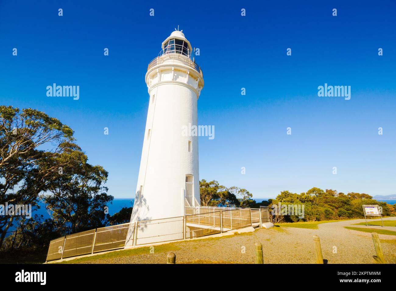 Colourful nautical infrastructure with a white brick touristic landmark ...