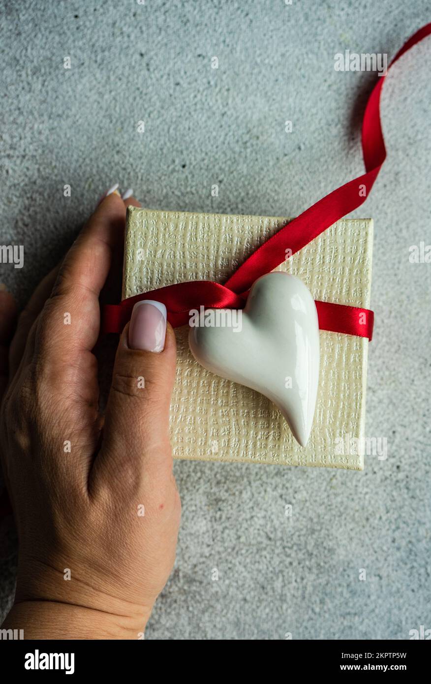 Hand reaching into box hi-res stock photography and images - Alamy