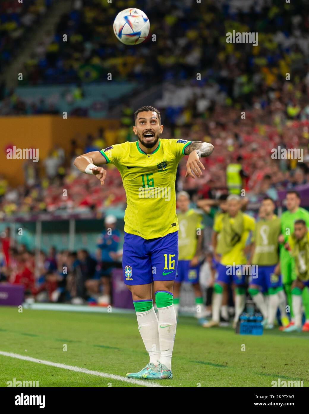 DOHA, QATAR - NOVEMBER 28: Player of Brazil Alex Telles passes the ball ...