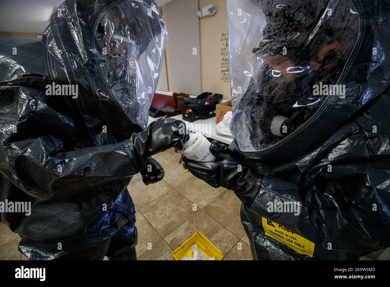 U.S. Air Force Staff Sgt. Alex Potts, right, survey team member, and ...