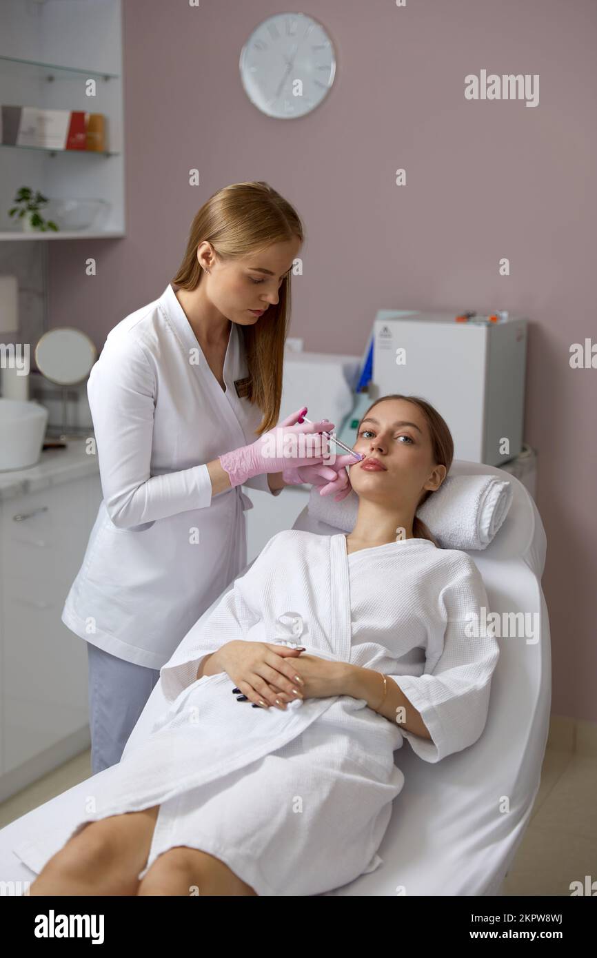 Rejuvenating facial injections procedure for tightening and smoothing ...