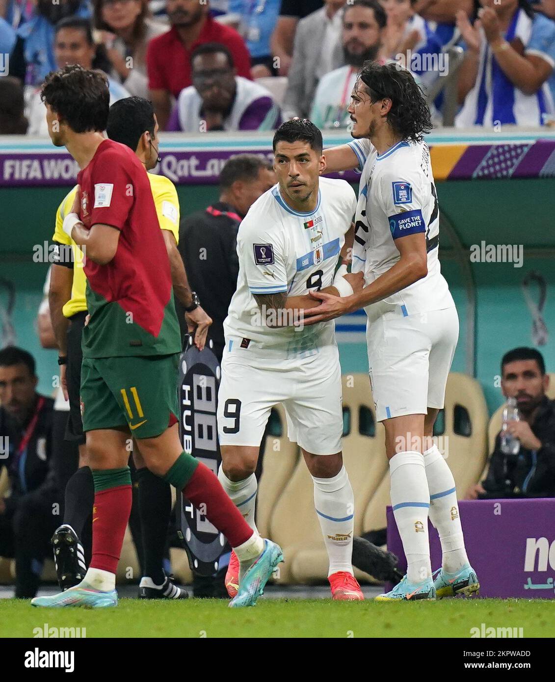 Uruguay's Luis Suarez (centre) replaces team-mate Edinson Cavani during ...