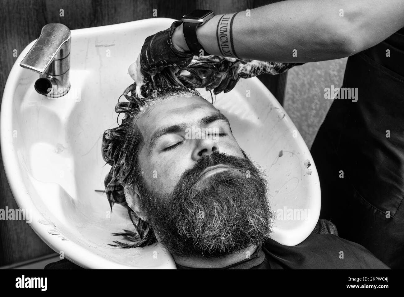 bearded man in hairdresser salon. beauty and fashion. hair and beard ...
