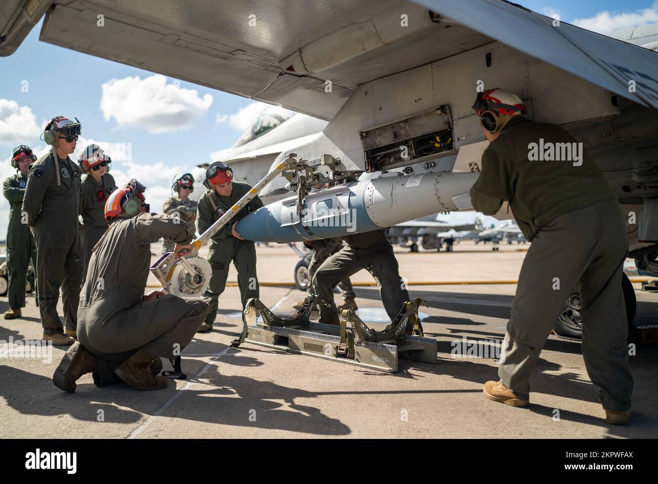 U.S. Marines with the All Type Model Series Armament Team (ATAT) re-arm ...