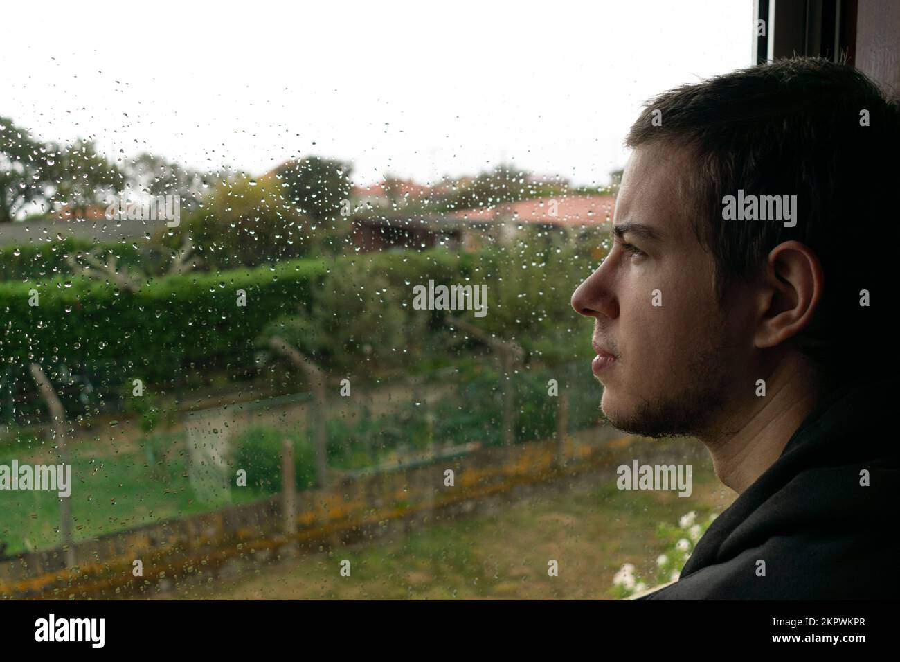 Looking out window rain hi-res stock photography and images - Alamy