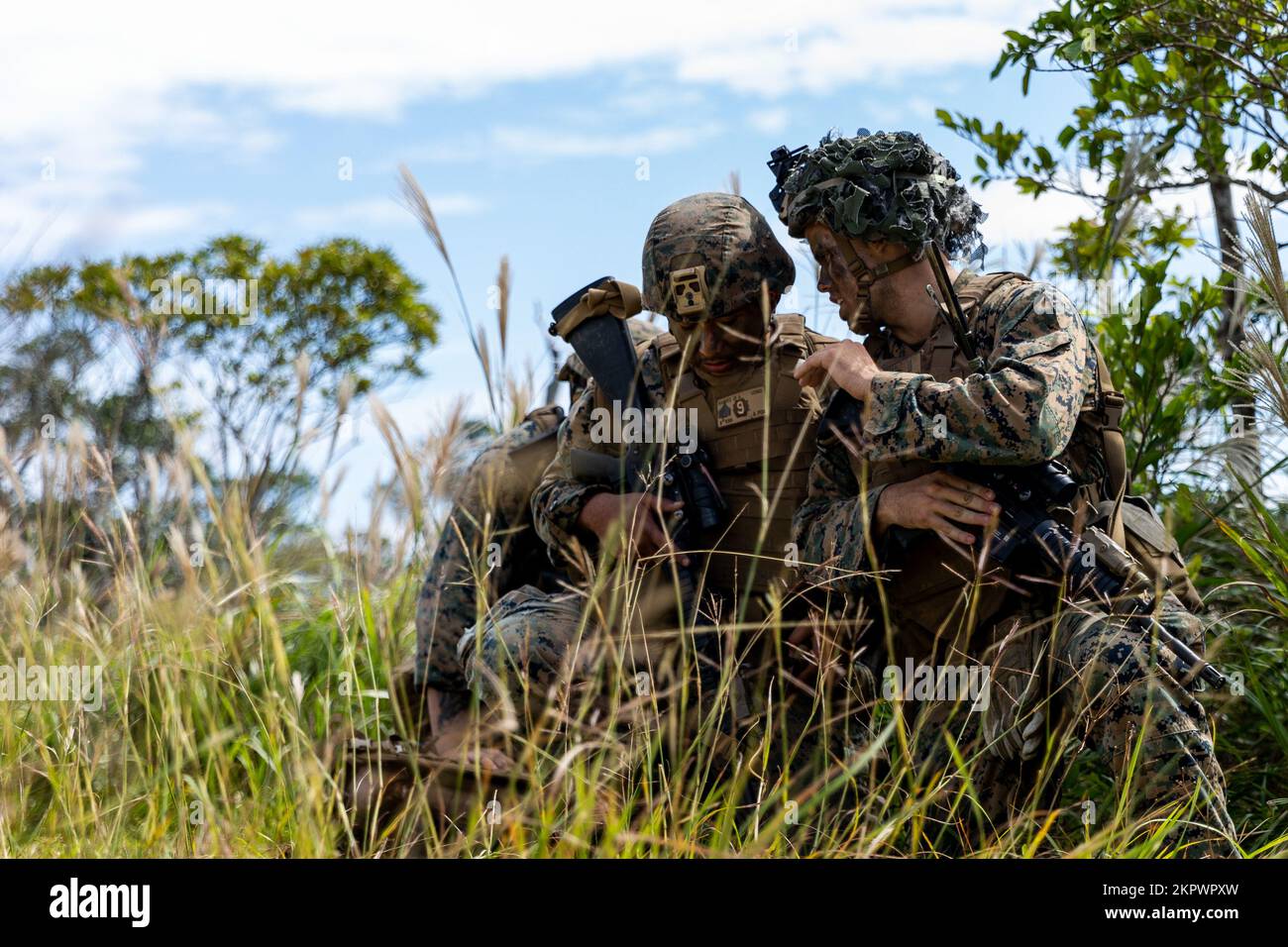U.S. Marine 2nd Lt. James A. Anders III, right, a combat engineer ...